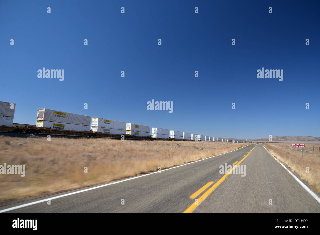 Huge American multiple unit freight train with 4 locomotives runs along ...