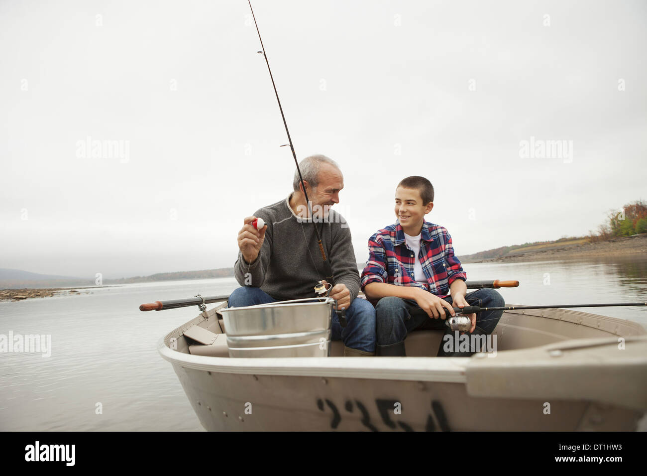 Boy fishing boat hi-res stock photography and images - Alamy