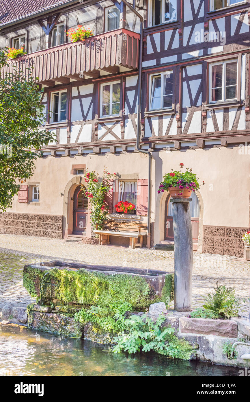 half-timbered house on the banks of a creek in the historic part of ...