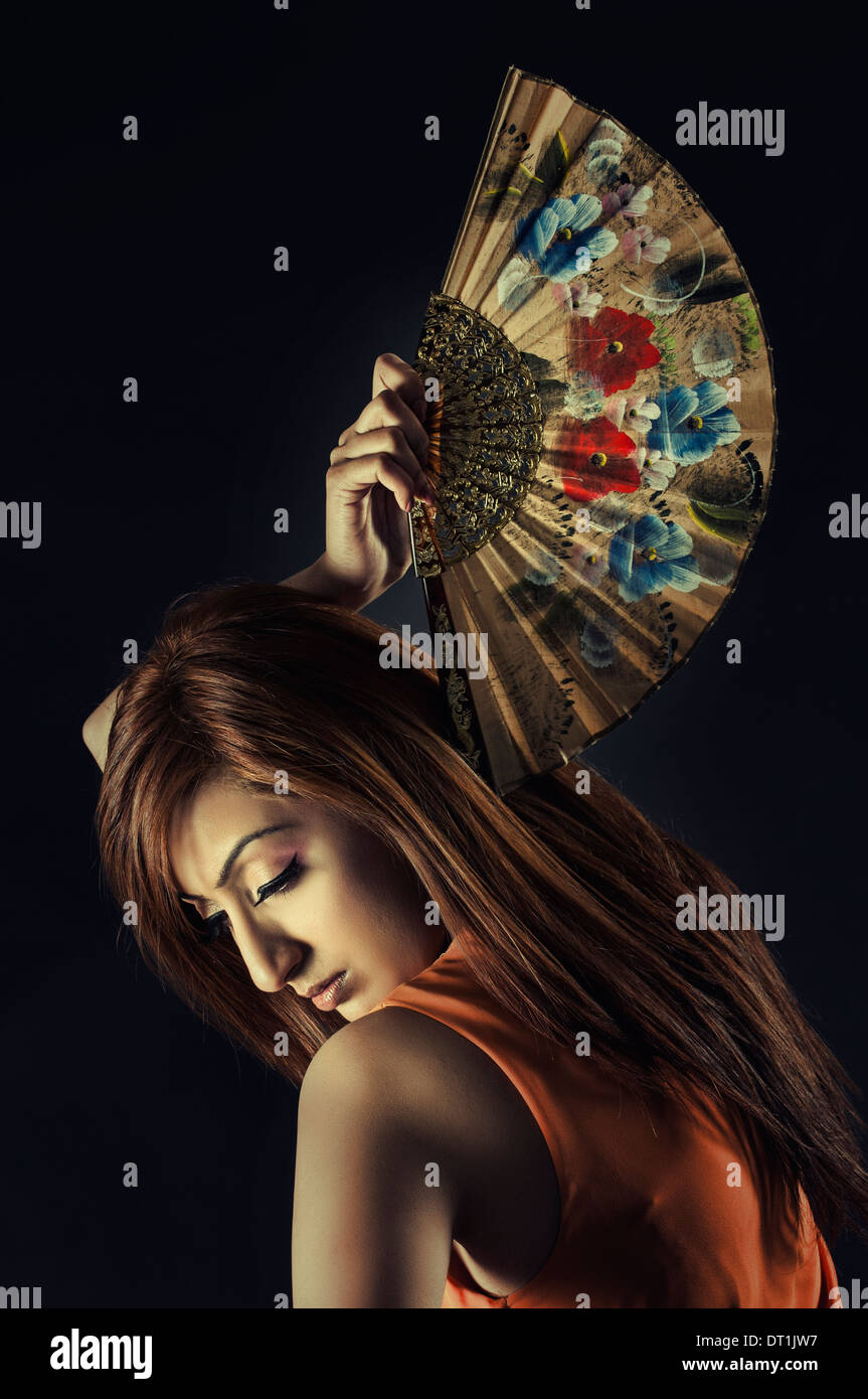 Indian hand holding fan indian hi-res stock photography and images - Alamy