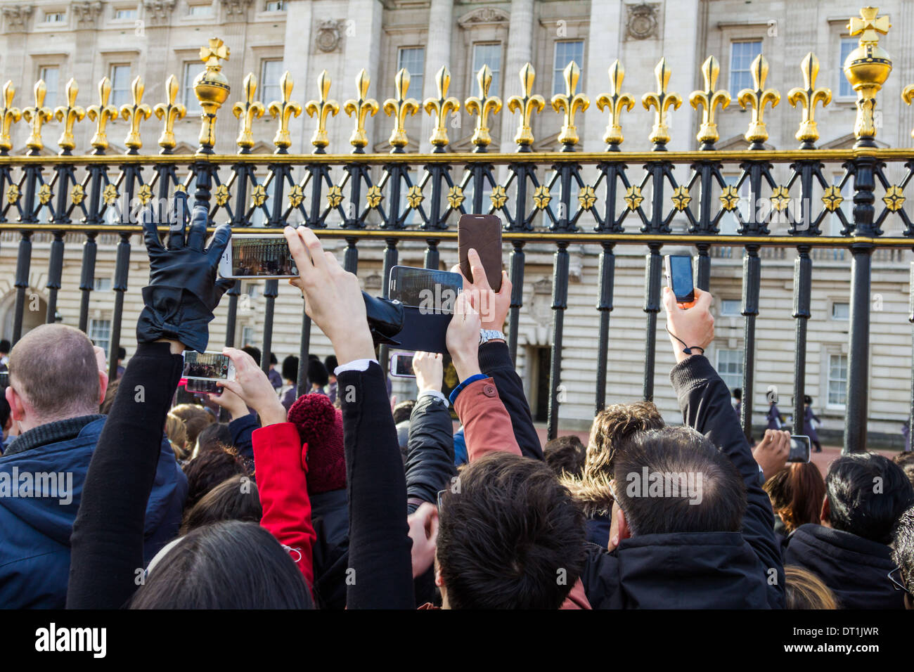 LONDON, UK, 2ND FEB 2014: People being the gates of Buckingham Palace ...