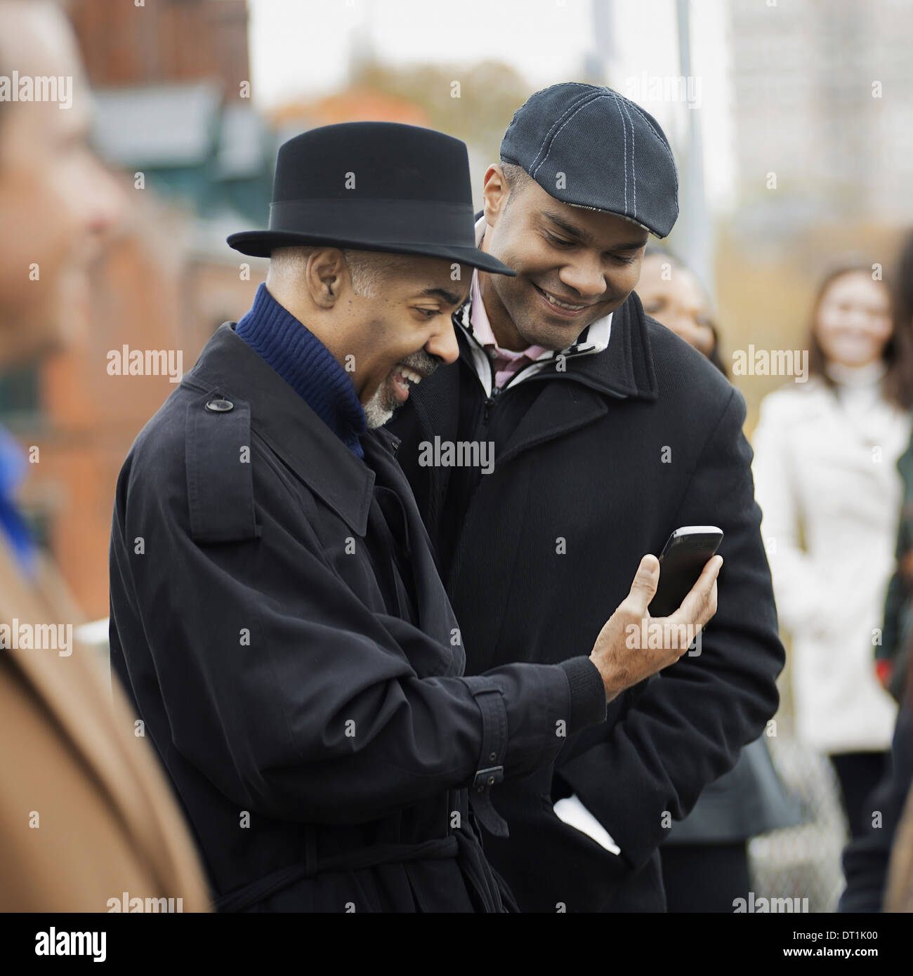 Two men standing side by side hi-res stock photography and images - Alamy