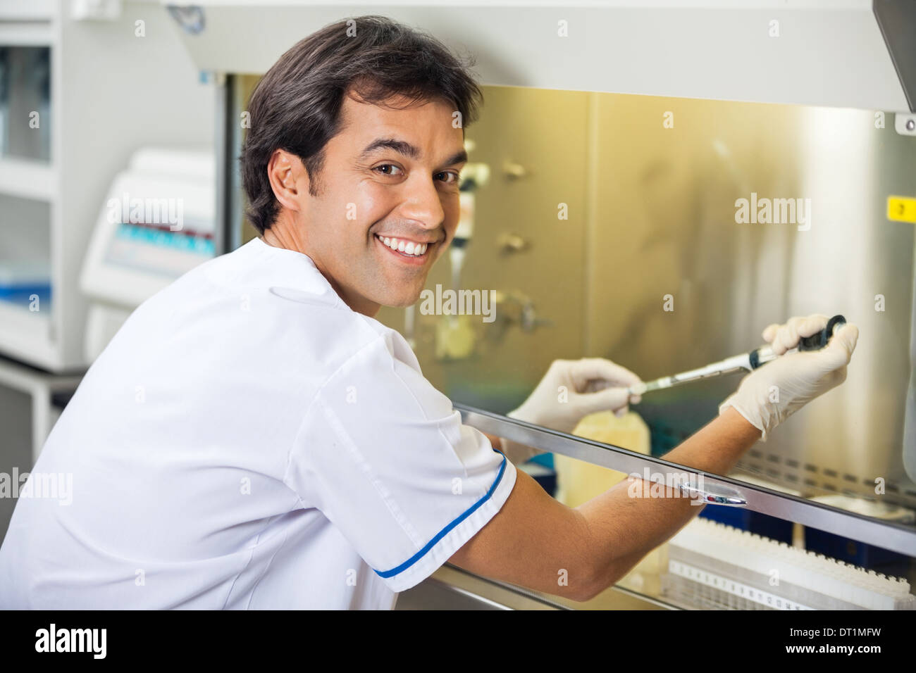 Male Technician Experimenting In Laboratory Stock Photo - Alamy