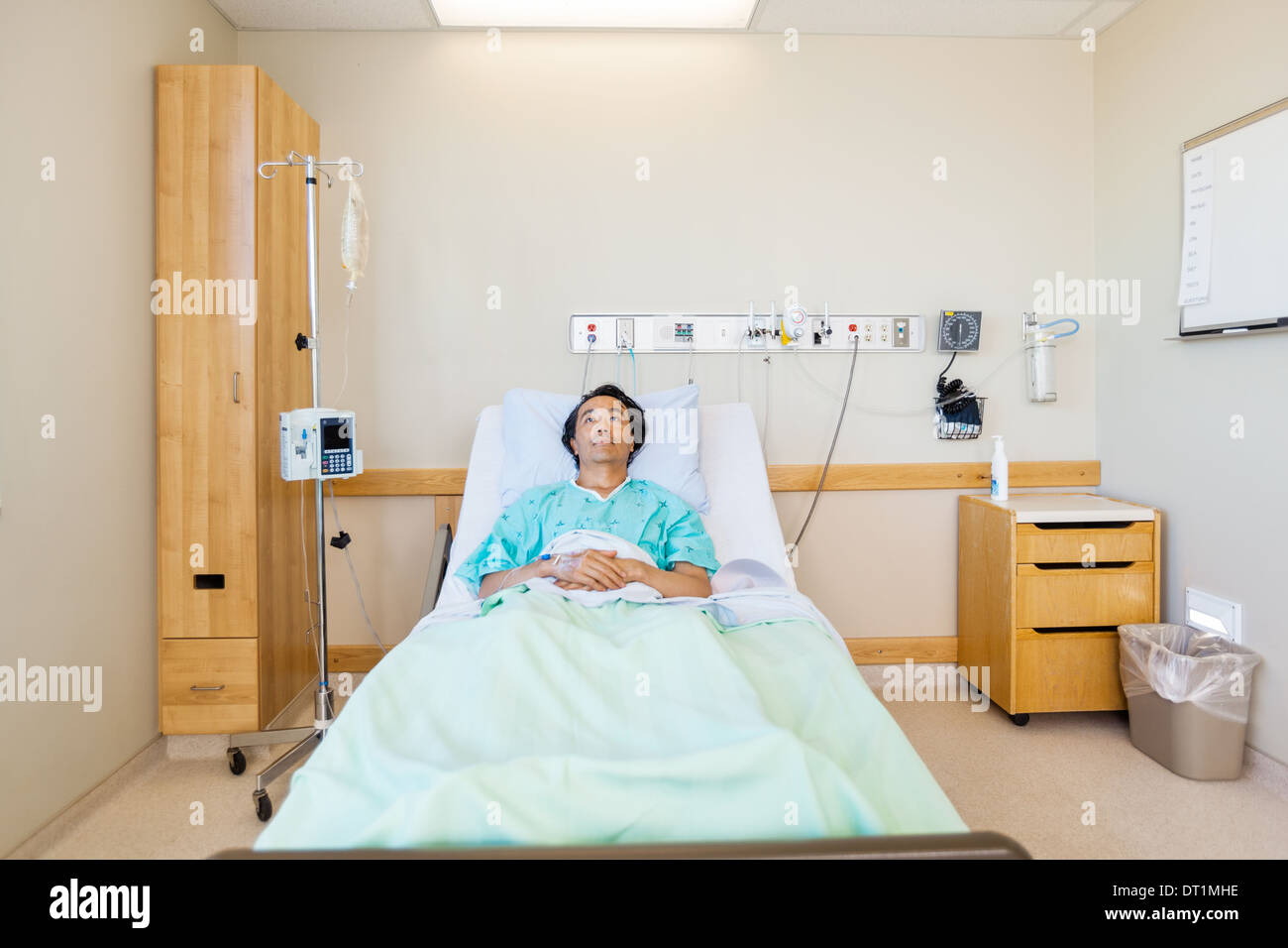 Patient Reclining On Bed While Looking Up In Hospital Stock Photo - Alamy