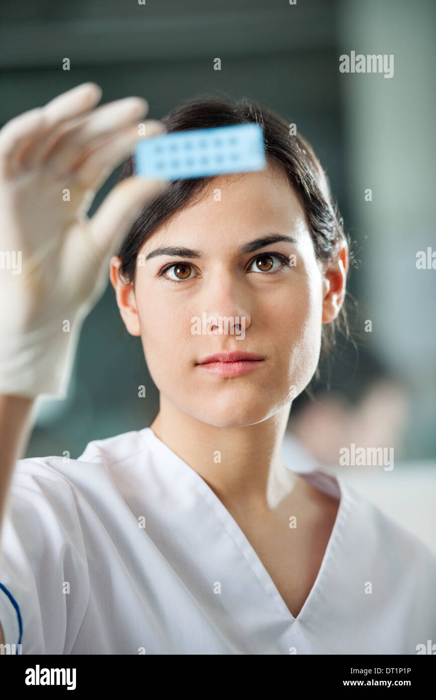 Scientist Analyzing Microscope Slide Stock Photo - Alamy