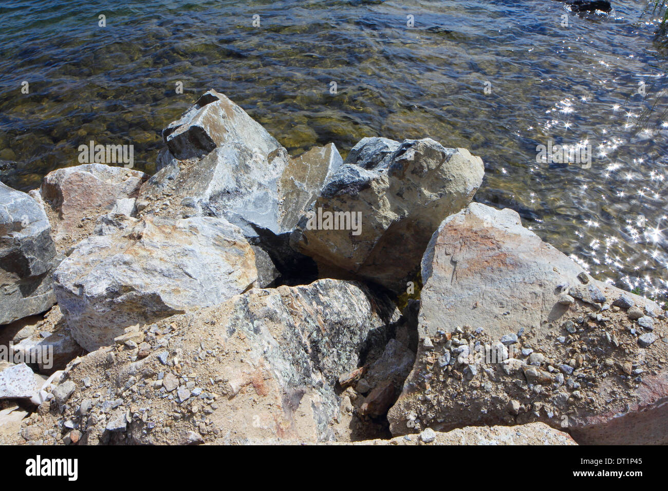 Sea waves lash line impact rock on the beach Stock Photo - Alamy