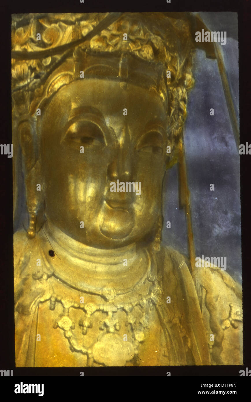 A photograph of a Golden Buddha statue in China, taken between 1917 and ...