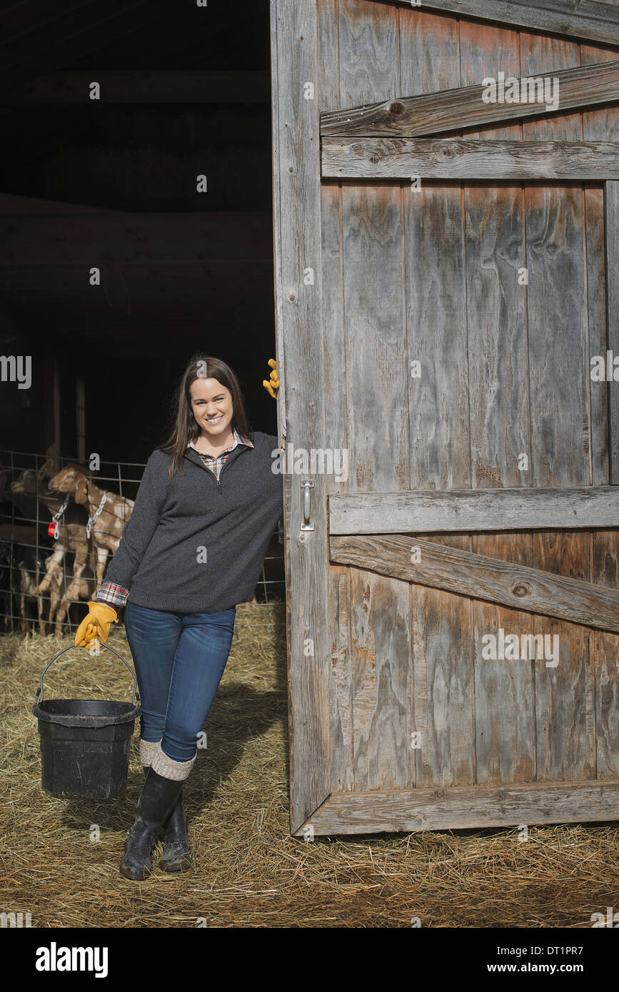Farmer working and tending to the animals hi-res stock photography and ...