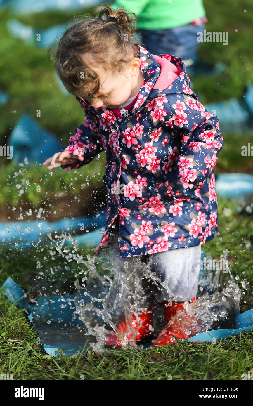 Splash Puddle Adult Stock Photos & Splash Puddle Adult Stock Images - Alamy