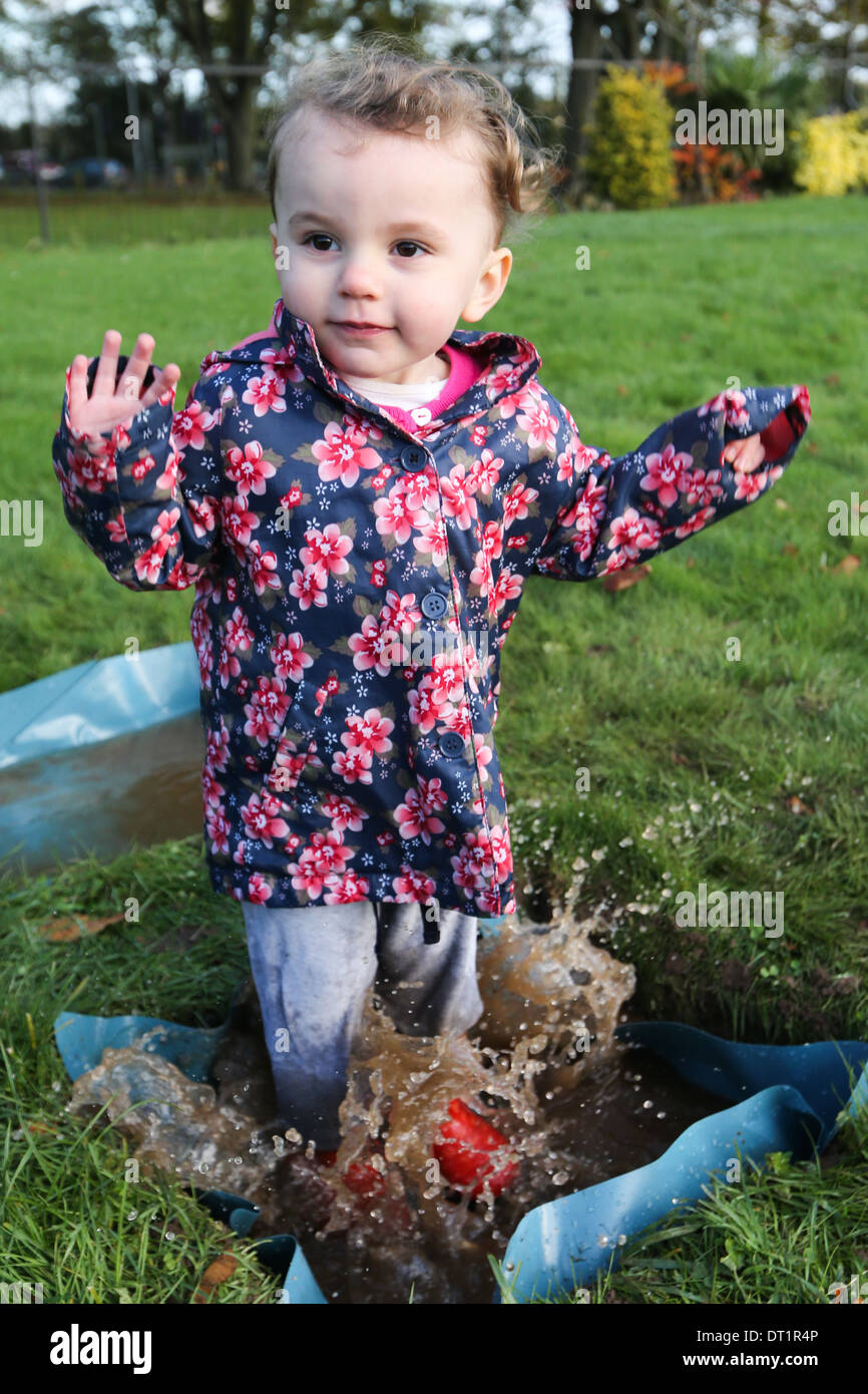 PEOPLE PRACTISING PUDDLE JUMPING TECHNIQUE AT WICKSTEED PARK,KETTERING ...