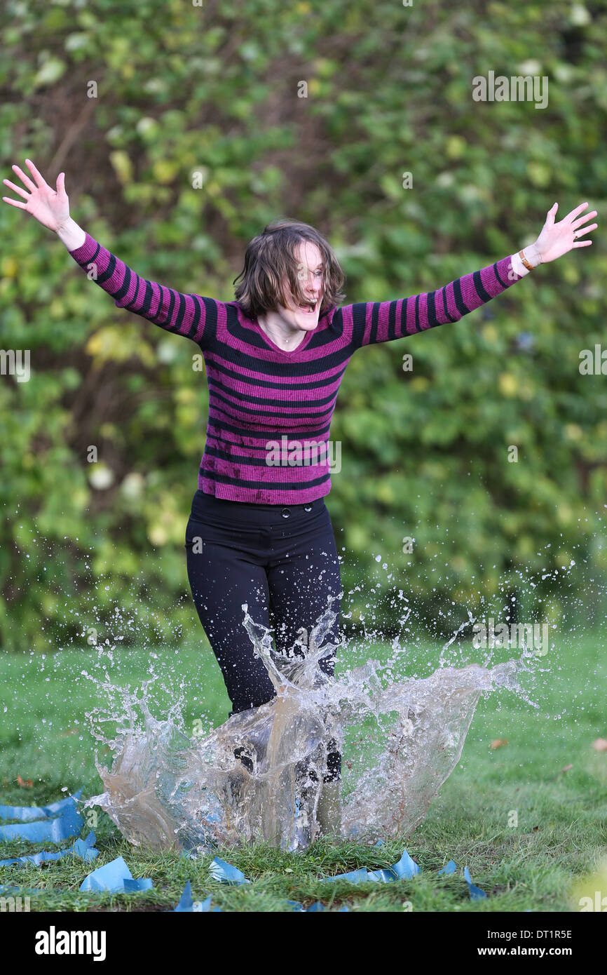 Splash Puddle Adult Stock Photos & Splash Puddle Adult Stock Images - Alamy