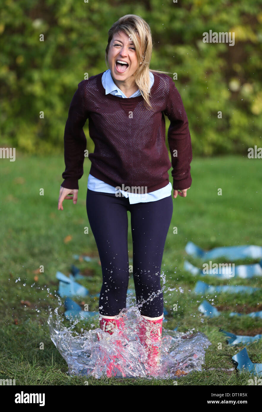 PEOPLE PRACTISING PUDDLE JUMPING TECHNIQUE AT WICKSTEED PARK,KETTERING ...