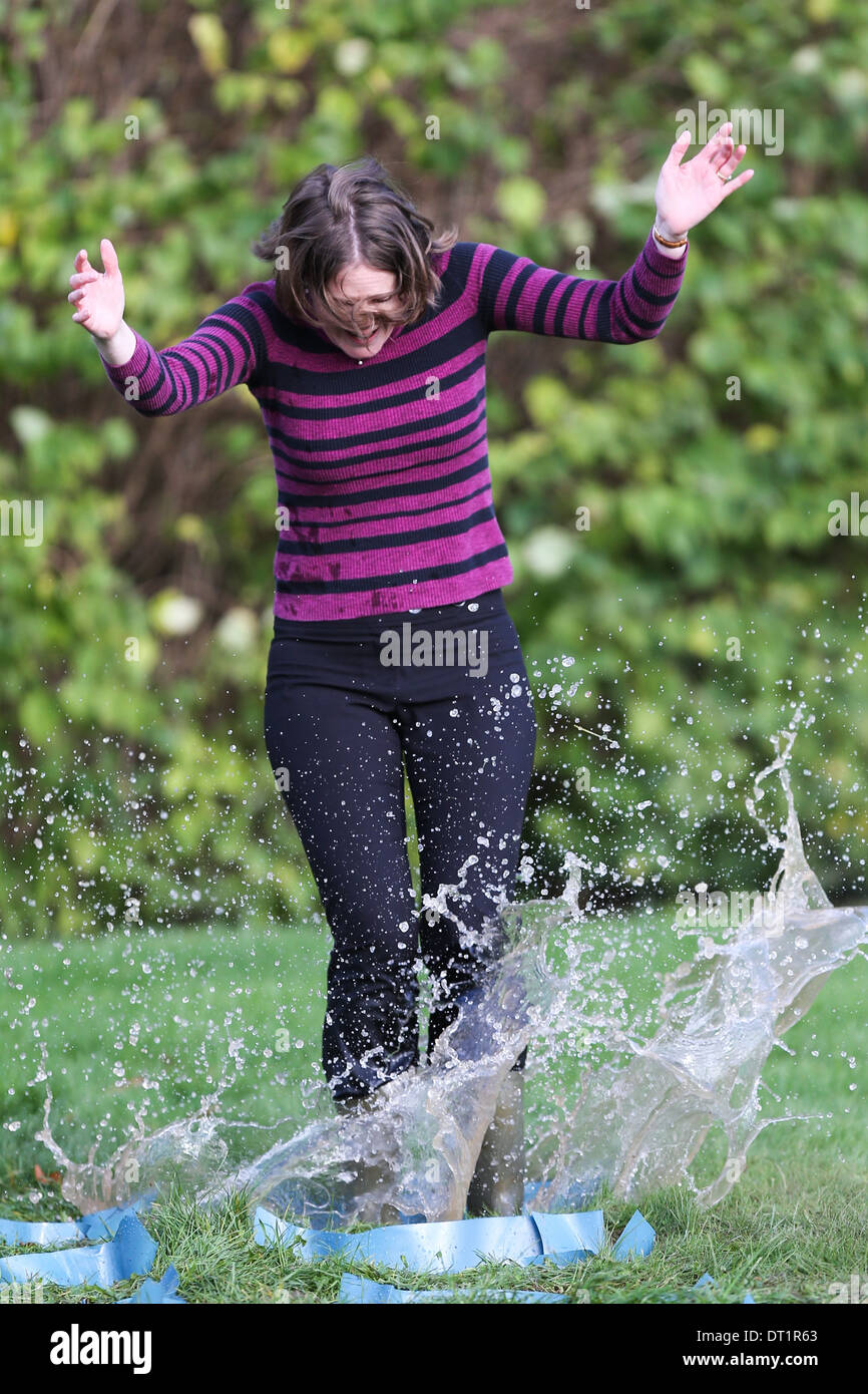 Splash Puddle Adult Stock Photos & Splash Puddle Adult Stock Images - Alamy