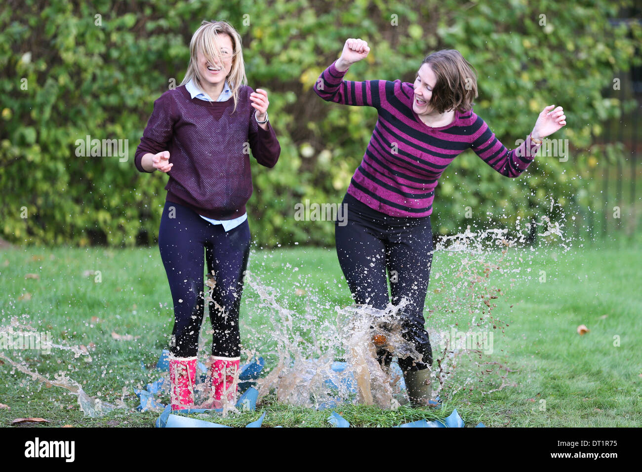 PEOPLE PRACTISING PUDDLE JUMPING TECHNIQUE AT WICKSTEED PARK,KETTERING ...