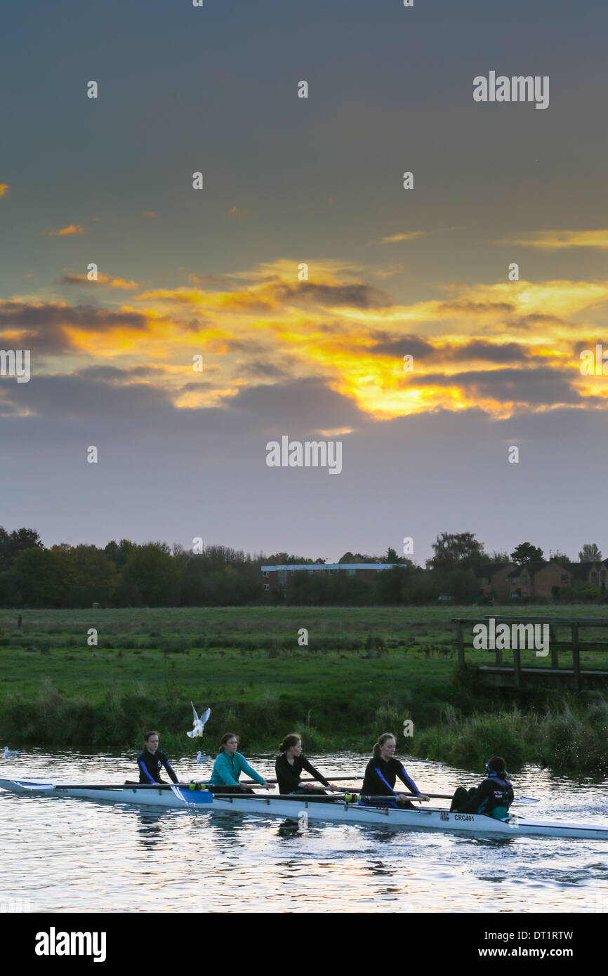 CAMBRIDGE UNIVERSITY STUDENTS OUT ROWING ON THE RIVER CAM IN CAMBRIDGE ...
