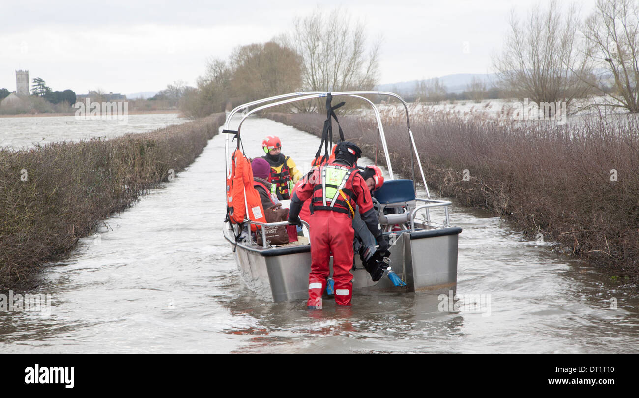 Emergency services humanitarian boat service for cut-off residents of ...
