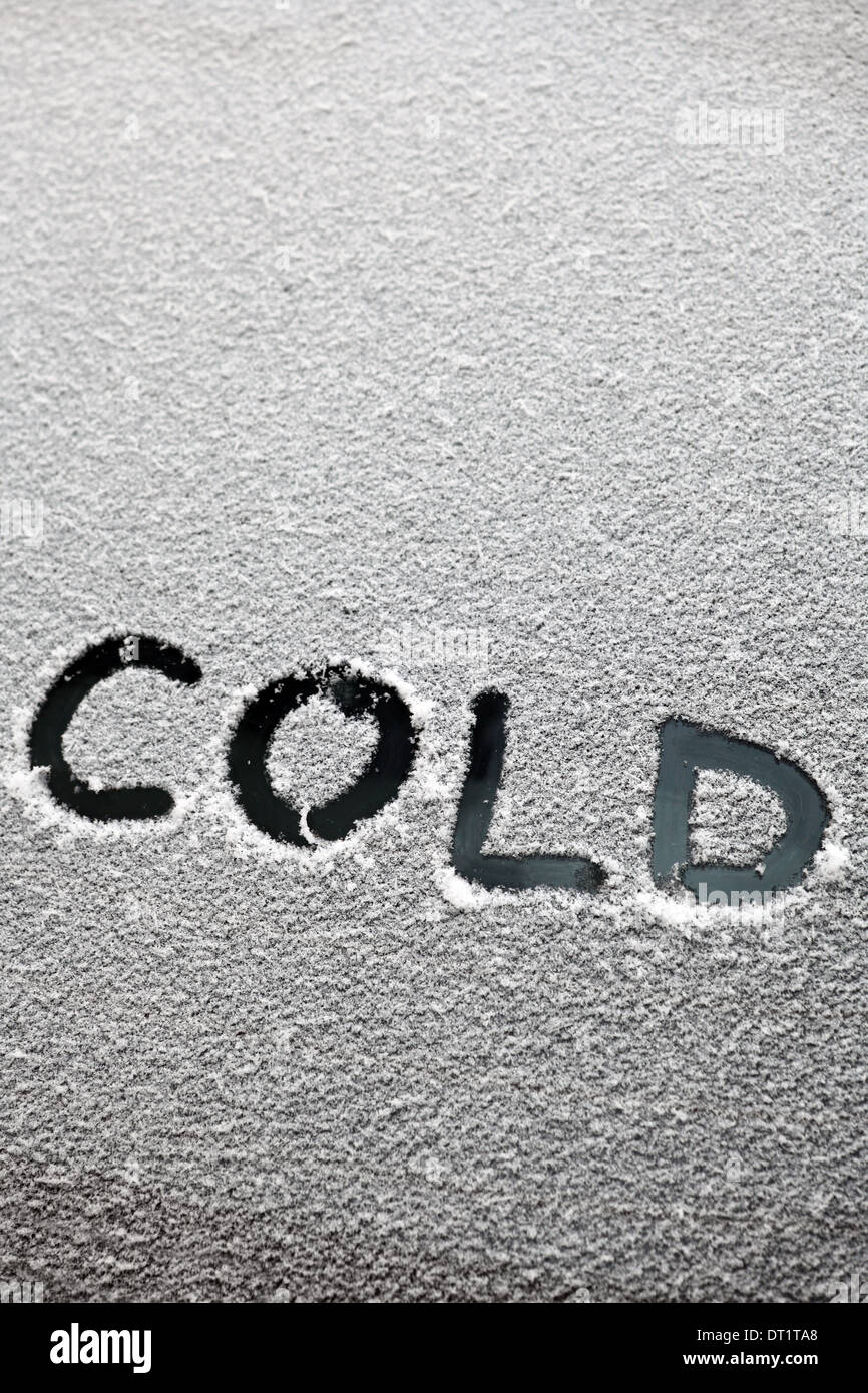 The word "cold" is written in the snow Stock Photo - Alamy
