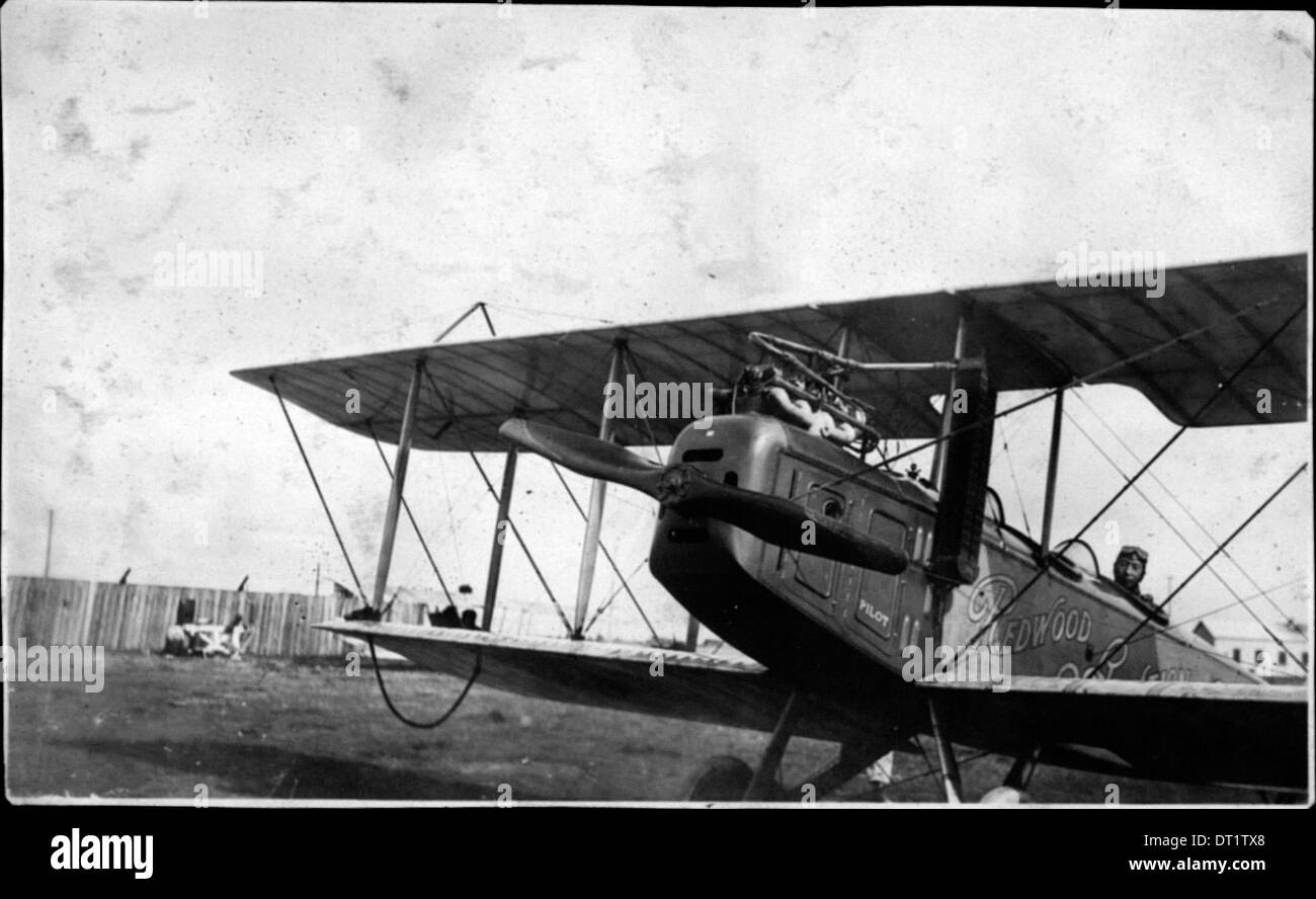 This photograph shows Hahn Jang Ho inside a plane, possibly engaged in ...