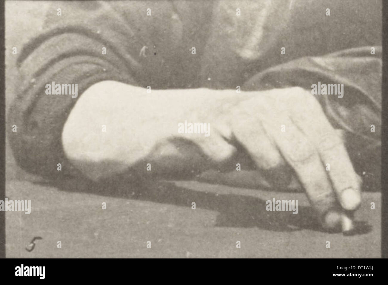 The photograph shows a hand drawing a circle, illustrating a simple yet ...