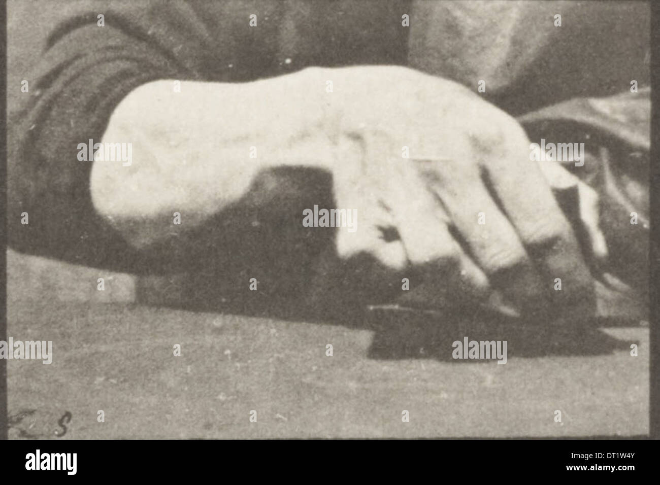 A hand drawing a circle, focused on the precise movement and technique ...