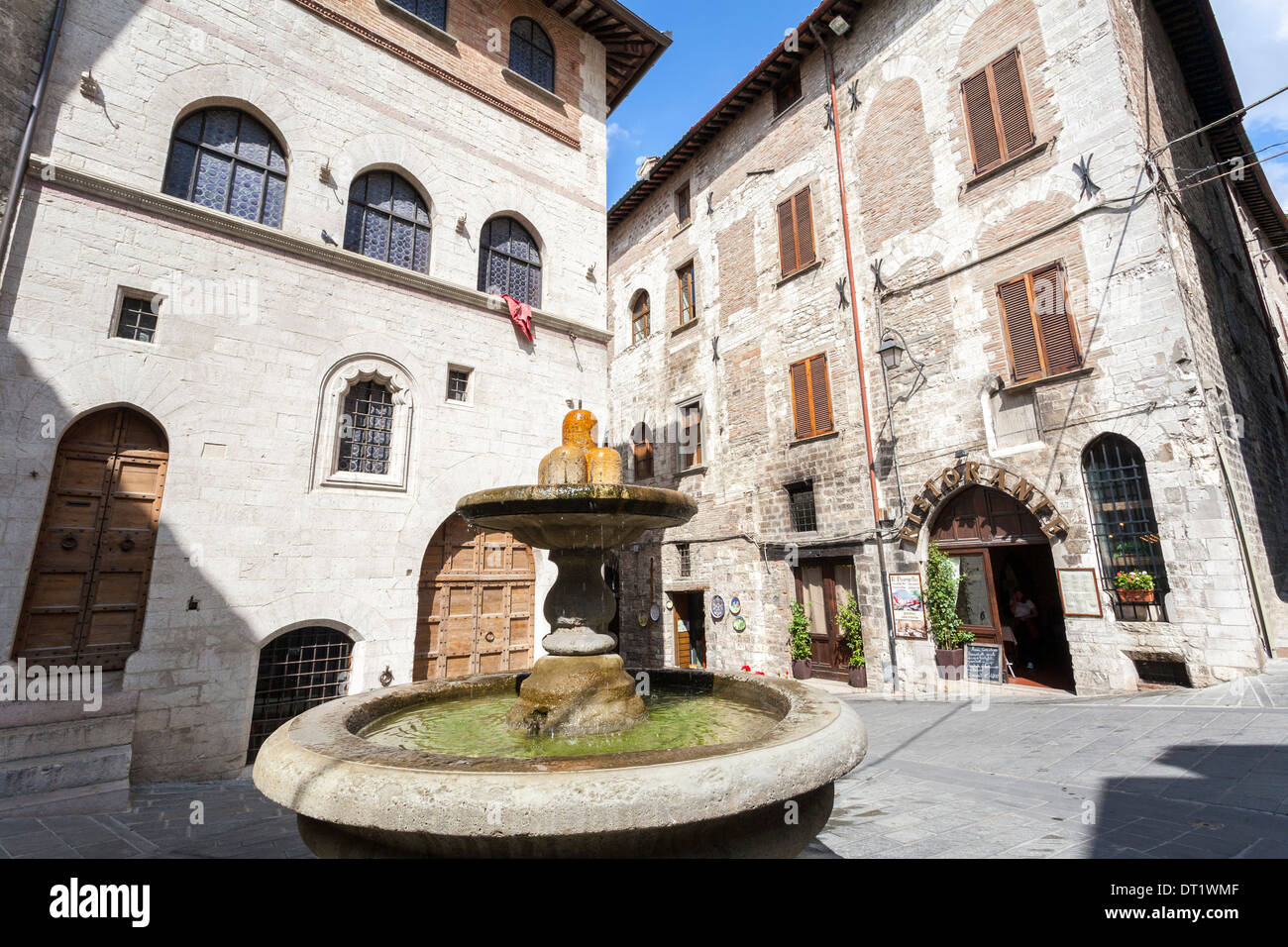 the medieval police station and the Fontana dei Matti Gubbio Umbria ...