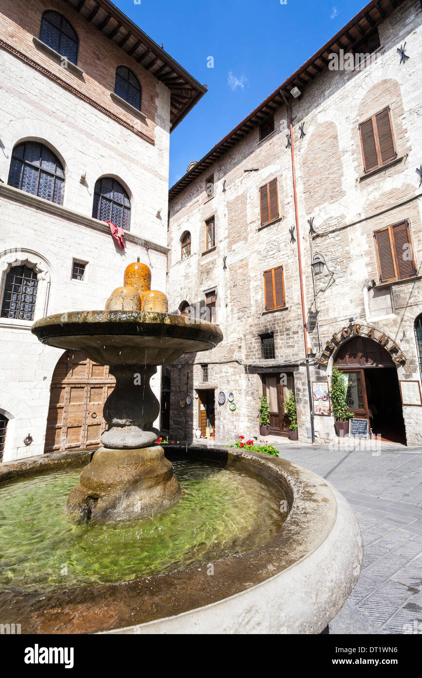 the medieval police station and the Fontana dei Matti Gubbio Umbria ...