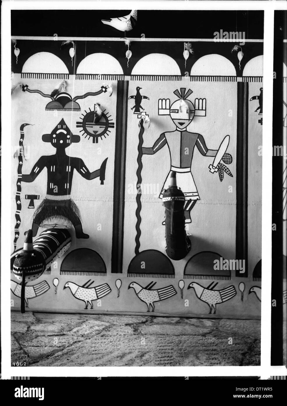 A photograph of a Hopi Indian altar featuring symbolic paintings of ...