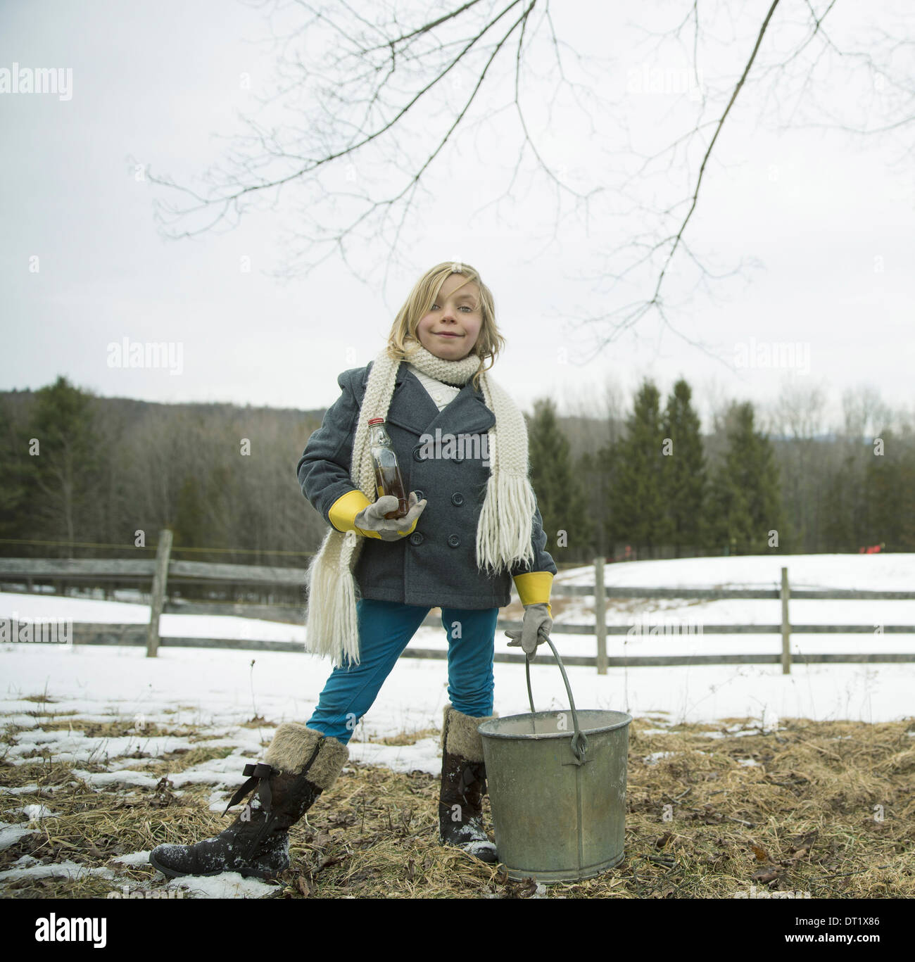 Girls Carrying Bucket High Resolution Stock Photography and Images - Alamy