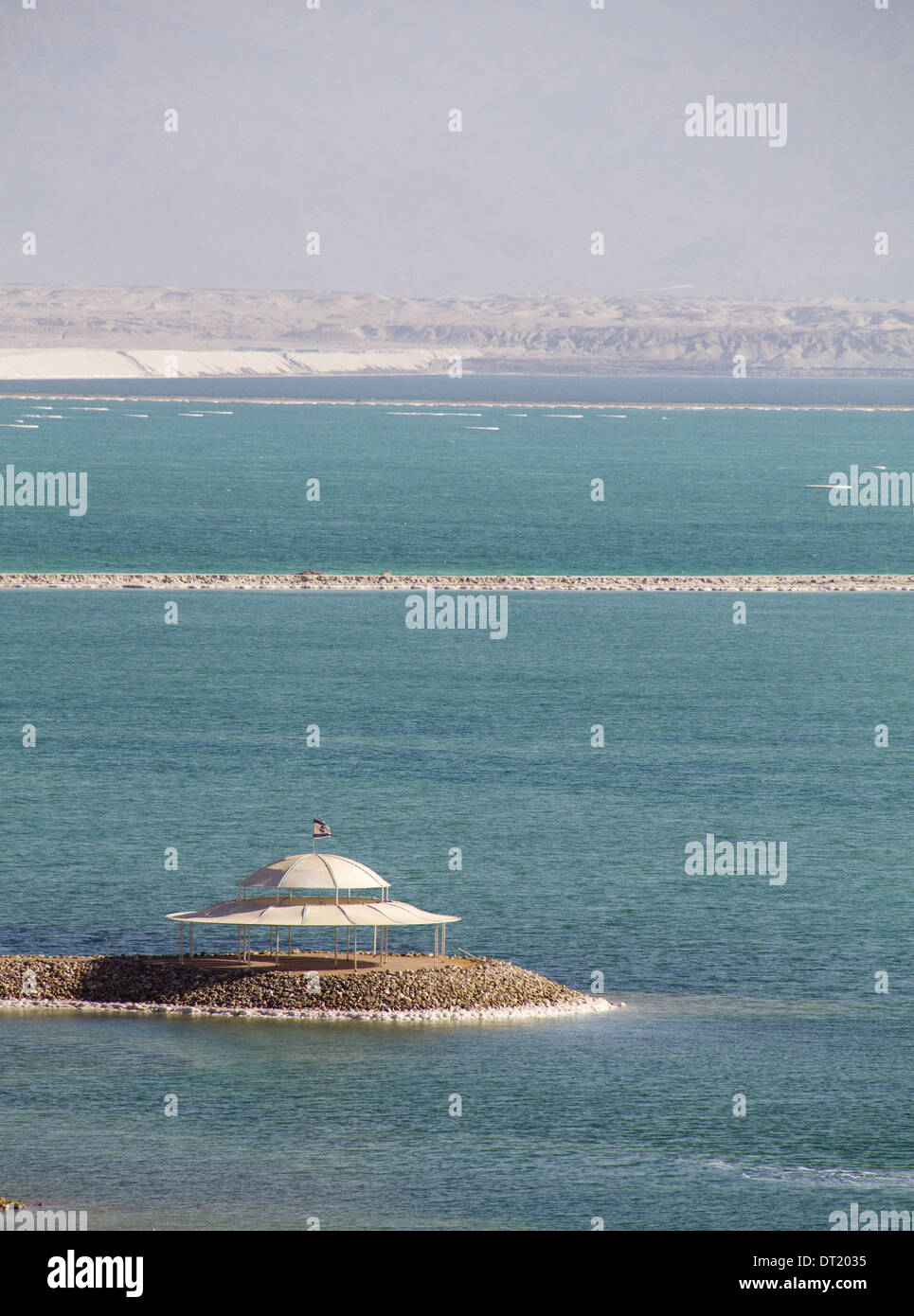 Dead Sea with Salt crystals and Umbrella on the beach.Israel Stock ...