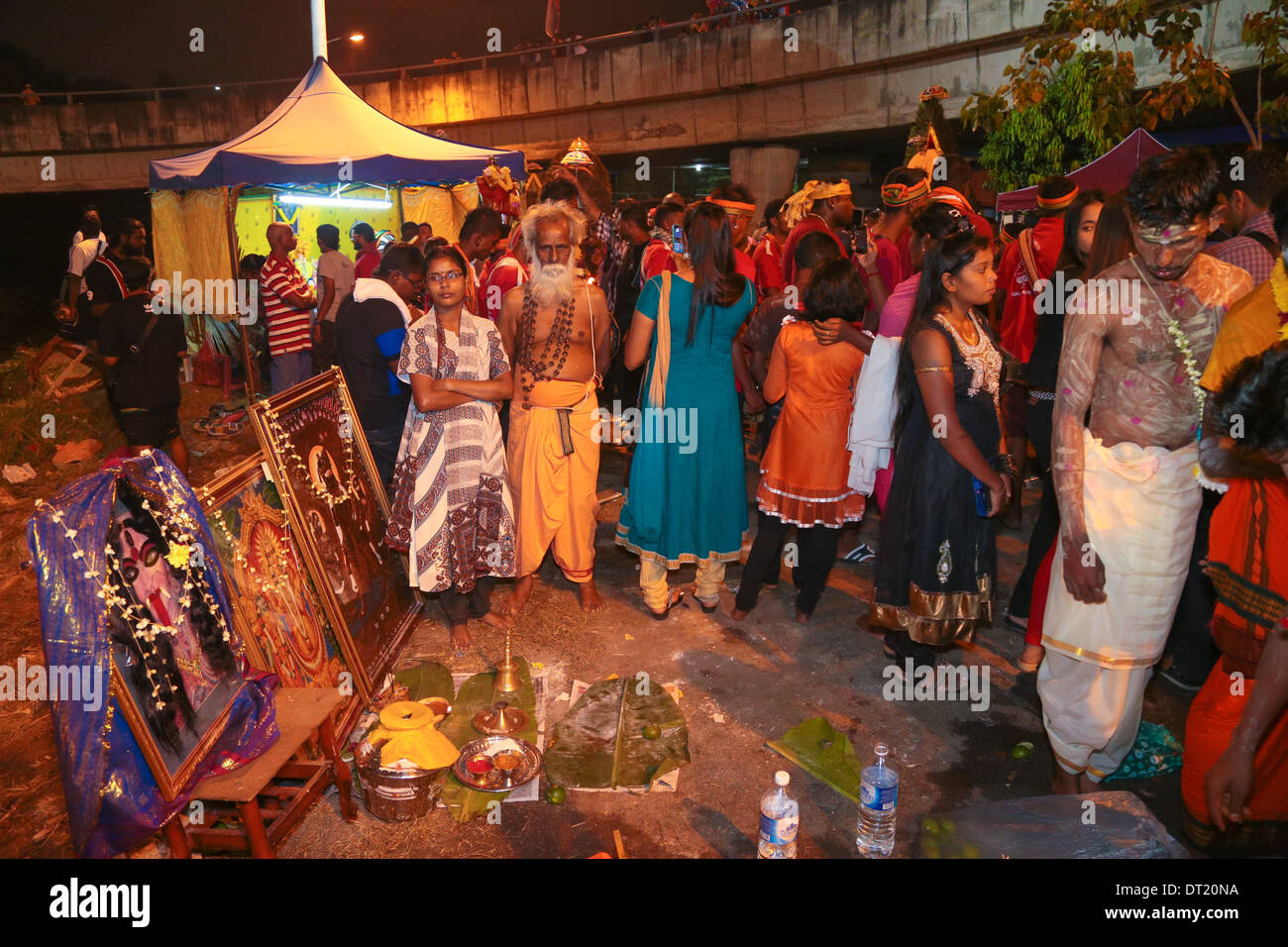 A hindu priest and his Thaipusam ritual altar at Batu Cave, Kuala ...