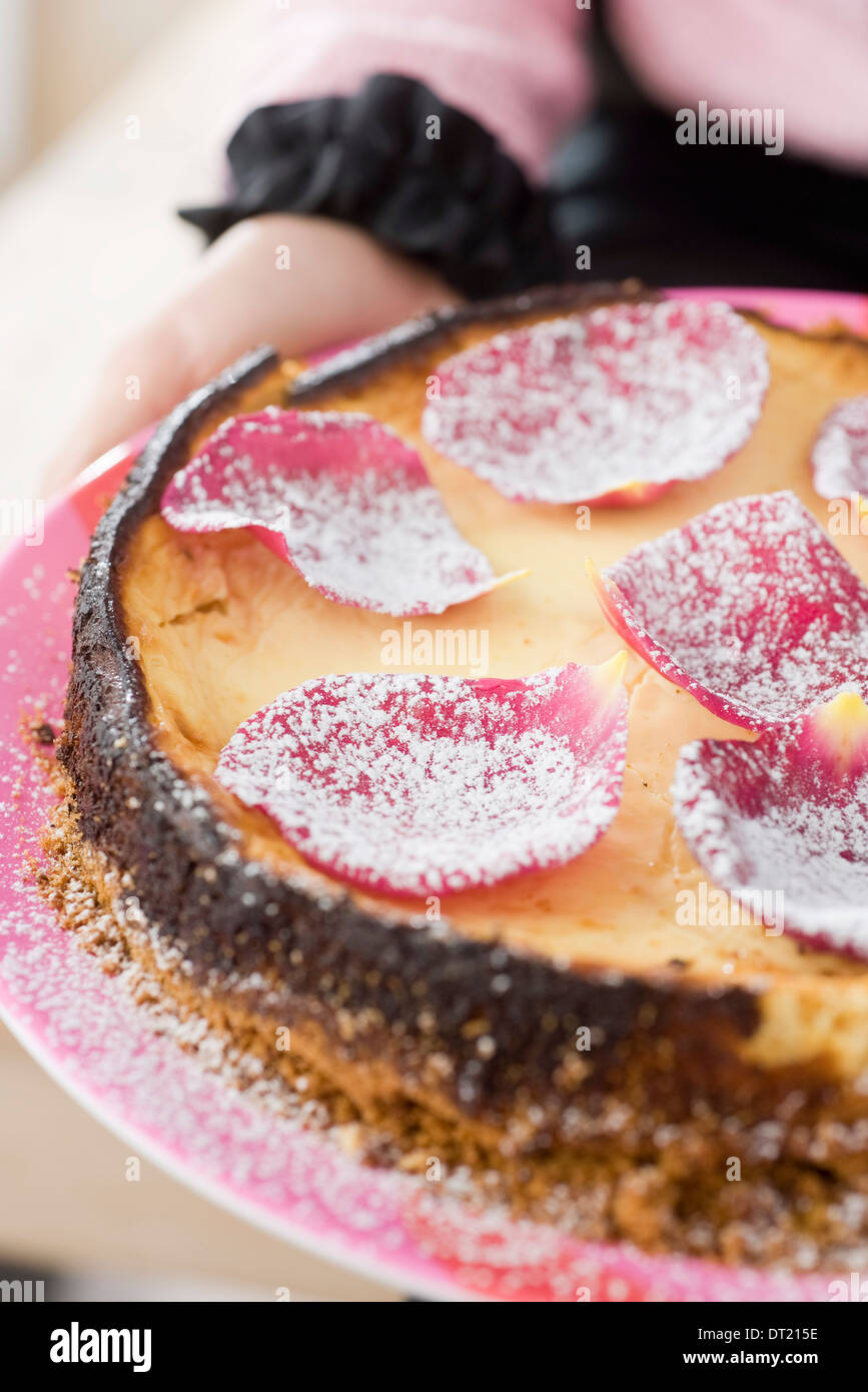 Cheesecake with rose Stock Photo - Alamy