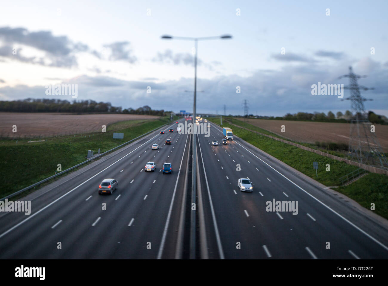 Fields on either side of road hi-res stock photography and images - Alamy