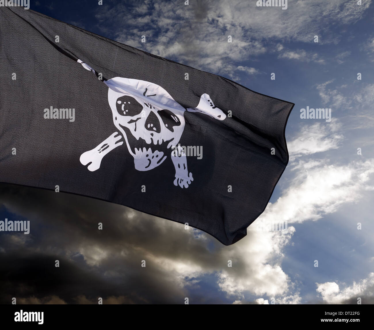 Jolly roger pirate flag flying hi-res stock photography and images - Alamy