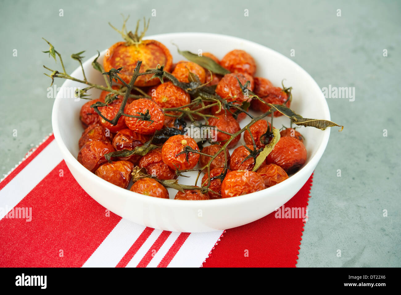 Tomatoes with lemon and raspberry vinegar Stock Photo - Alamy