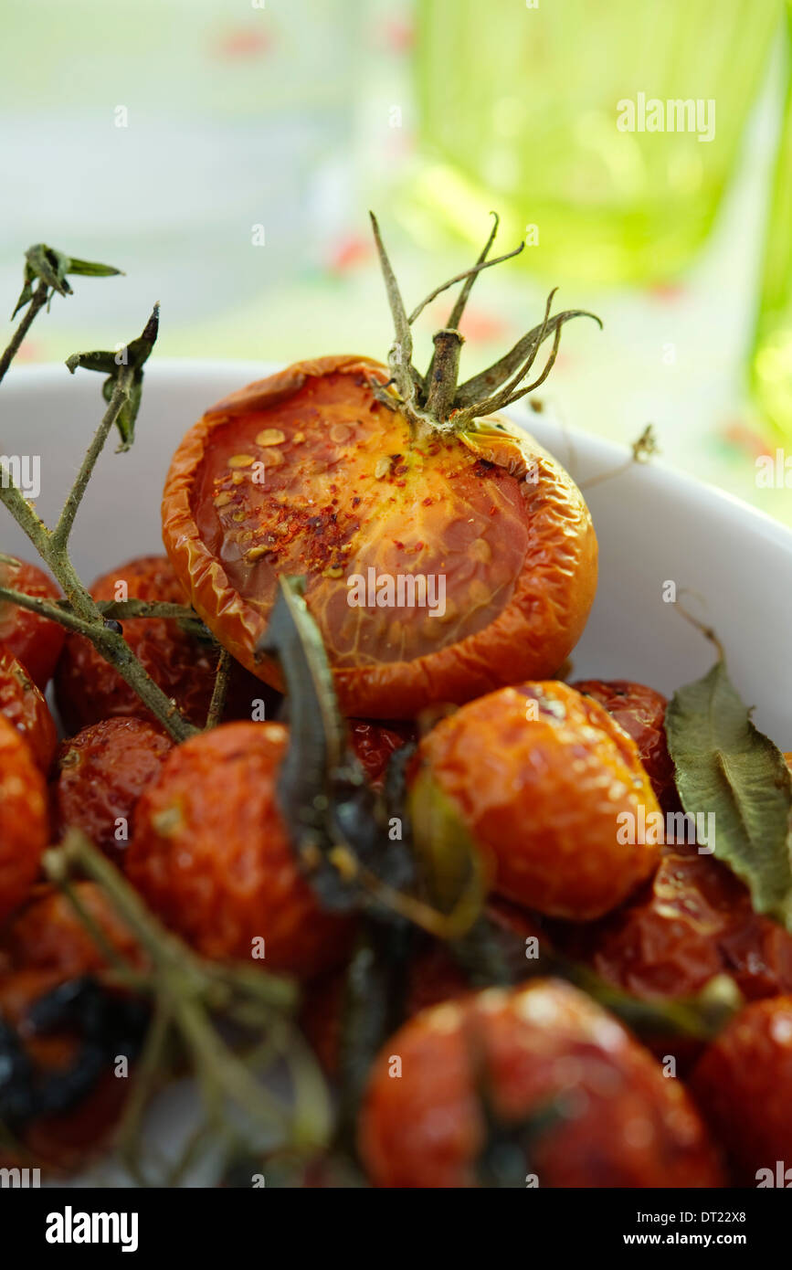 Tomatoes with lemon and raspberry vinegar Stock Photo - Alamy