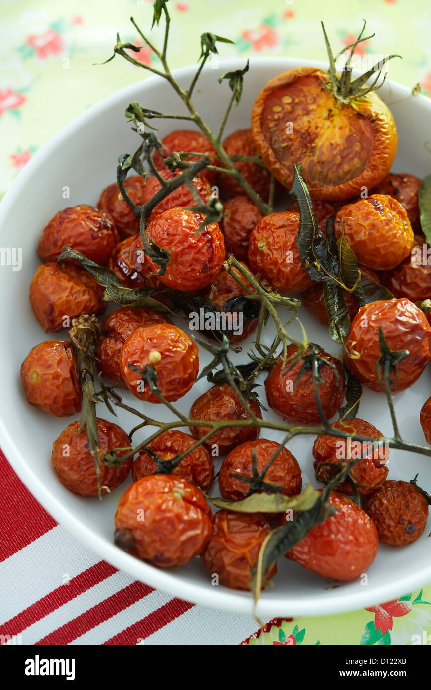 Tomatoes with lemon and raspberry vinegar Stock Photo - Alamy