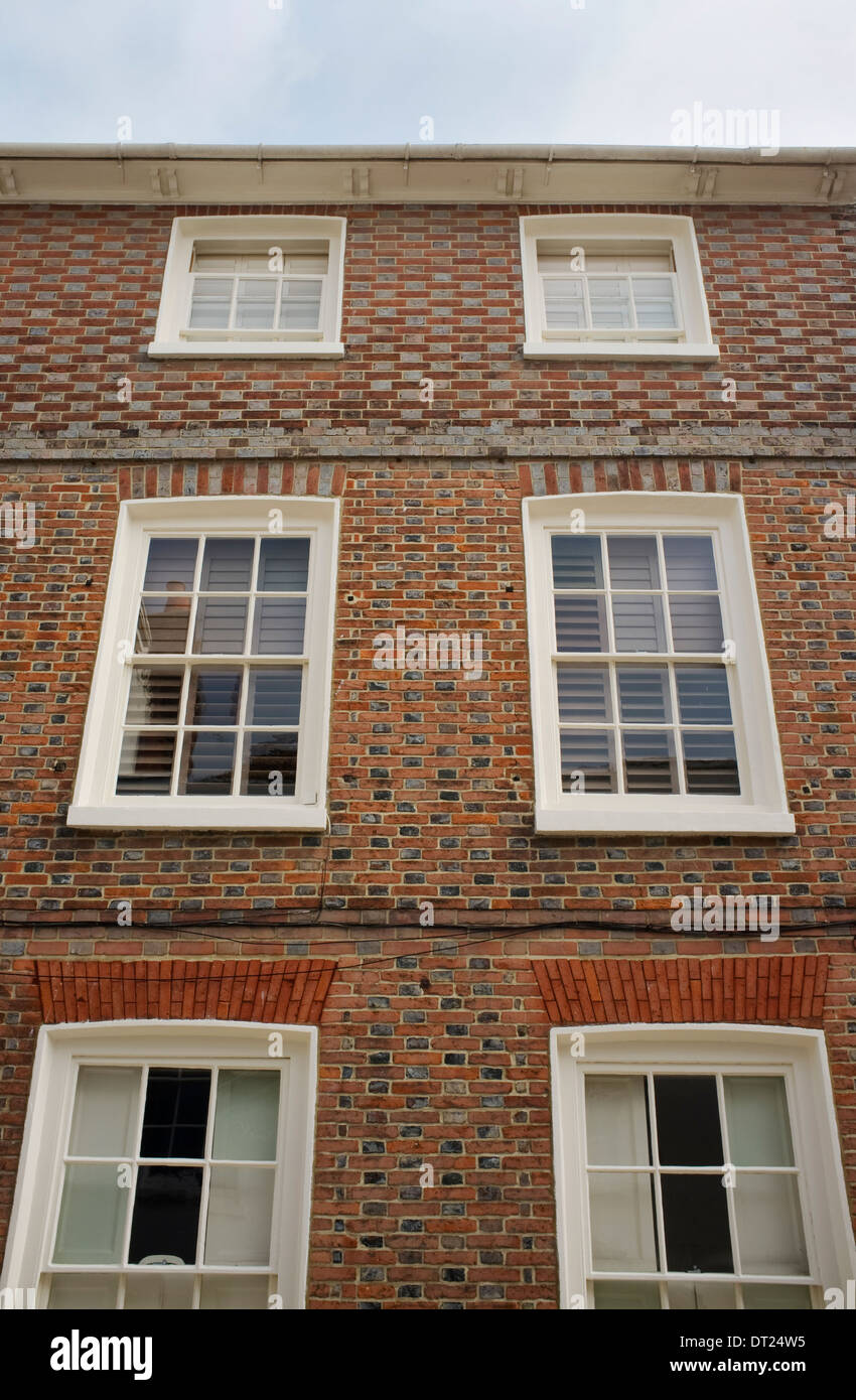 Traditonal red brick and flint town architecture in the city of ...