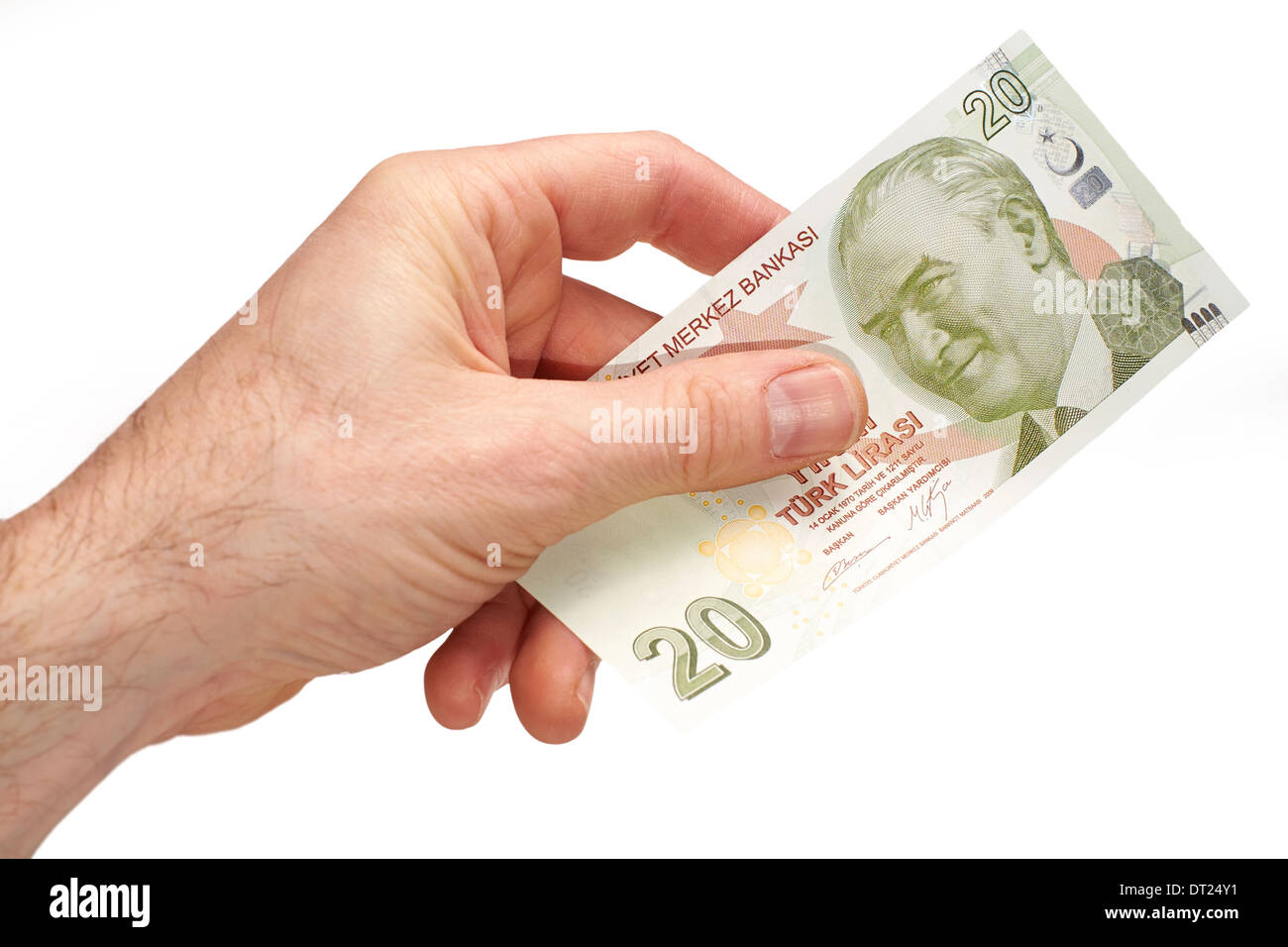 A hand holding a Turkish 20 Lira note, on a white background Stock ...