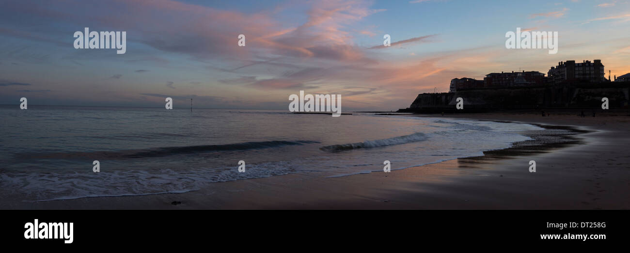 sunset sand pink amber sky cliffs tide out Stock Photo - Alamy