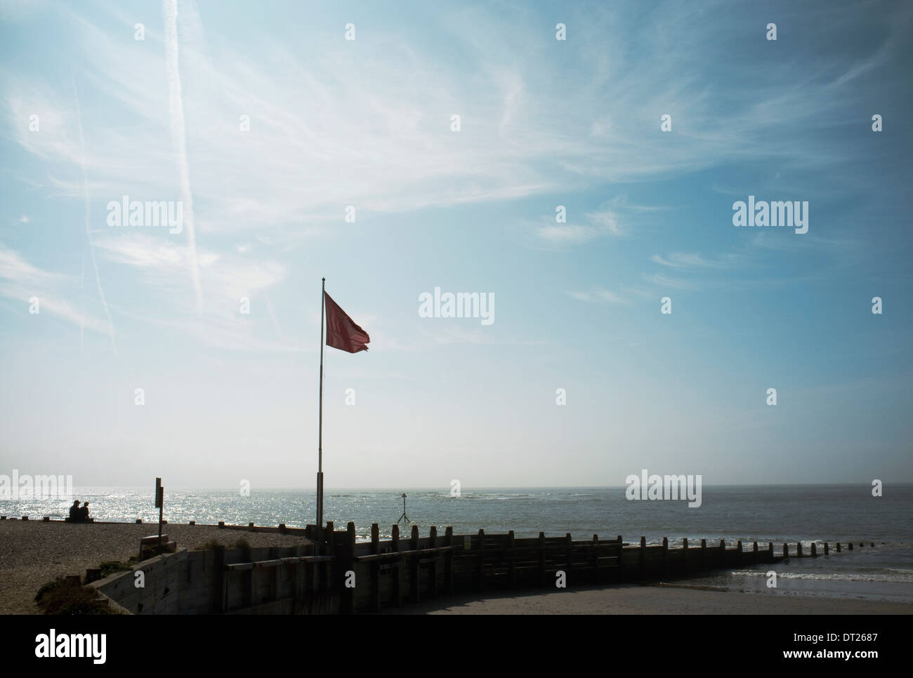 Red flag warning of dangerous currents at the sandy beach at West ...