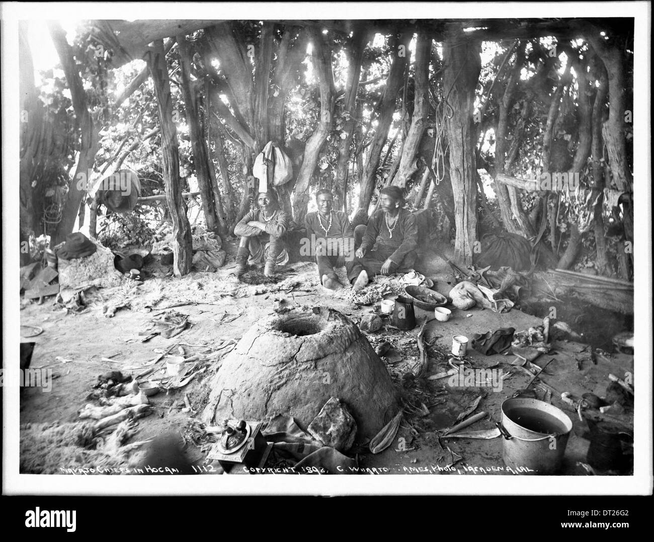 A photograph showing the interior of a Navajo chief's hogan, with ...