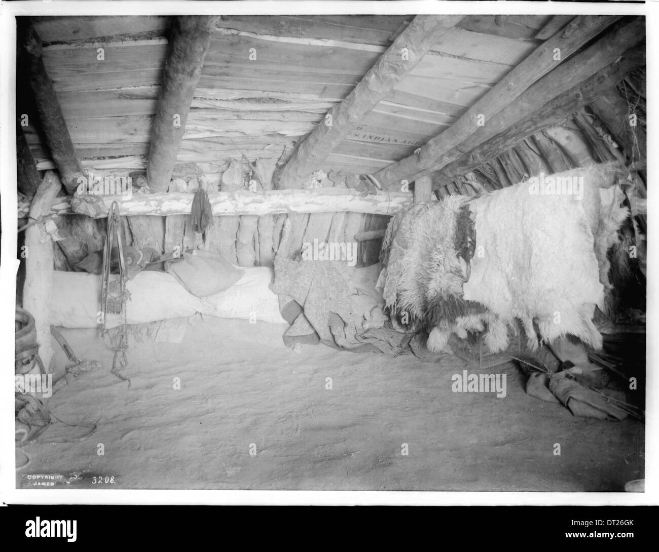 An interior view of a traditional Navajo hogan, photographed around ...