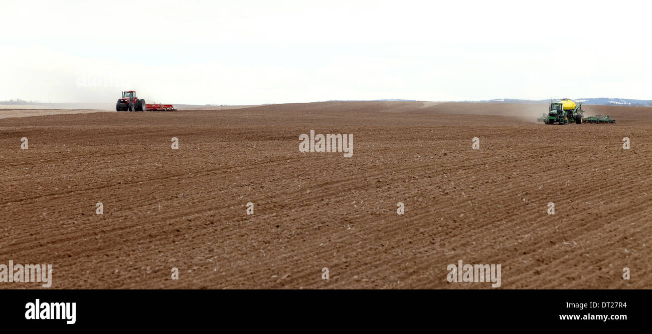 Plowing and fertilizing farm field hi-res stock photography and images ...