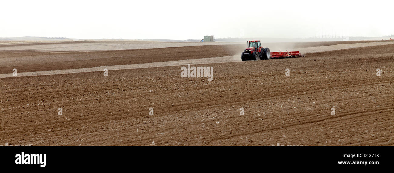 Tractors plowing hi-res stock photography and images - Alamy
