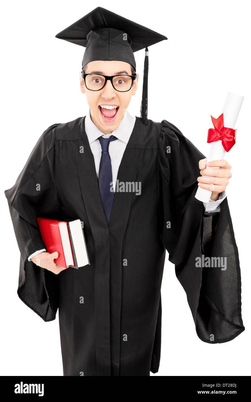 Young man in graduation gown holding books and a diploma Stock Photo ...