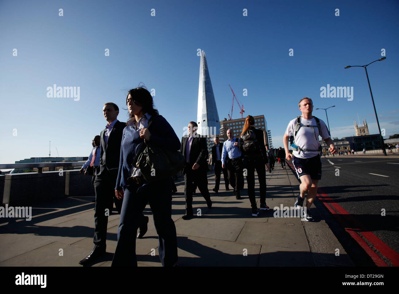Commuters walk on London Bridge the shard Stock Photo - Alamy