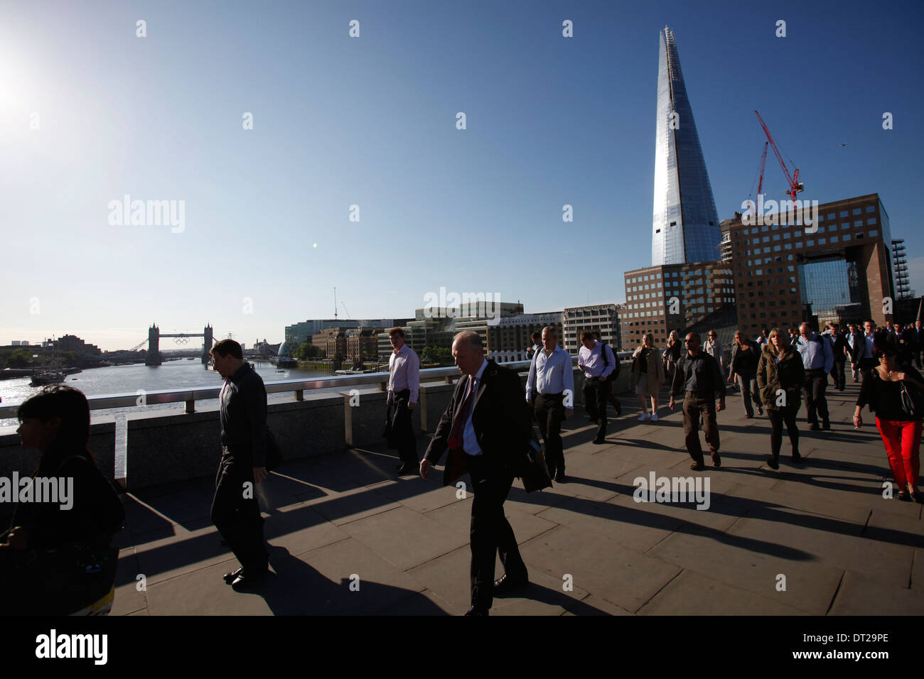 Commuters walk on London Bridge the shard Stock Photo - Alamy