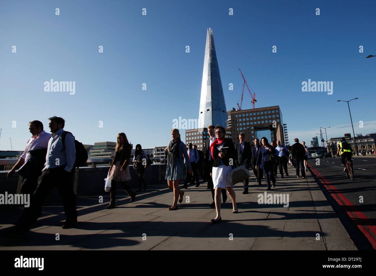 Commuters walk on London Bridge the shard Stock Photo - Alamy