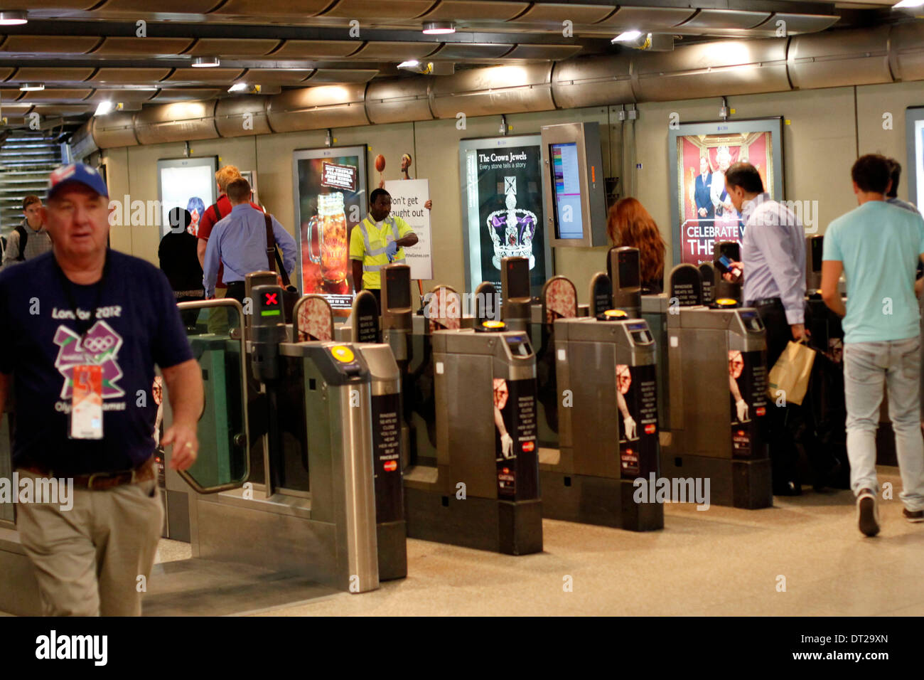 Commuters are seen on the platform of the Jubilee line at London Bridge ...