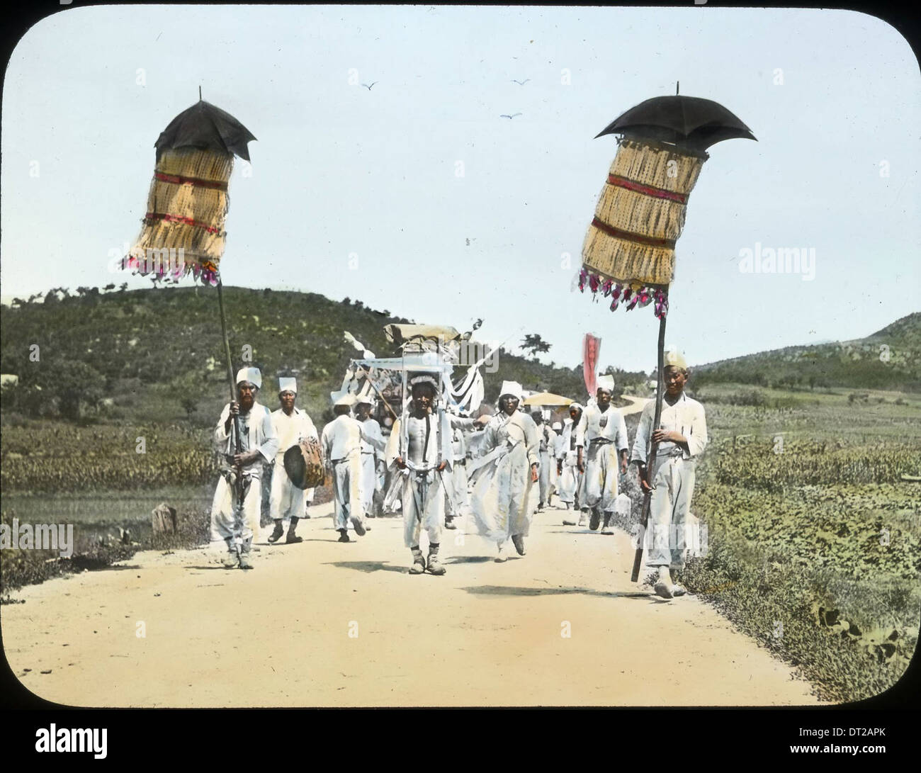 A photograph of a Korean funeral, taken during the late 19th or early ...